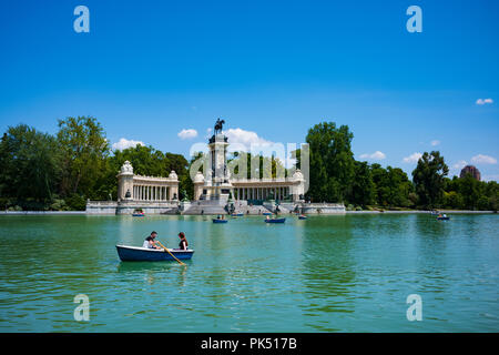 The Retiro Park Lake is a popular spot for visitors who enjoy rowboats ...