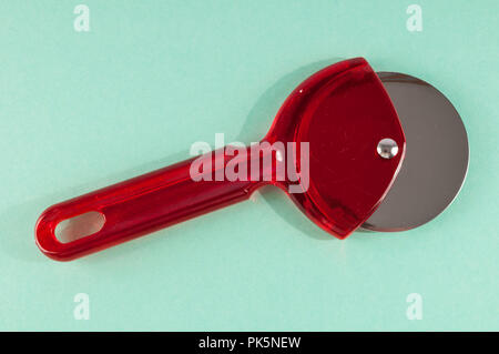Picture of Plastic Red Pizza Cutter Slicer Knife Stock Photo - Alamy