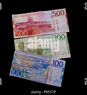 Swedish currency bank notes depicting famous Swedes on black background ...