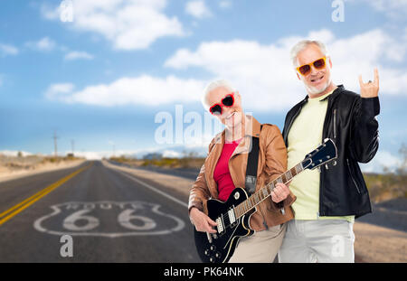 senior couple with electric guitar over route 66 Stock Photo - Alamy