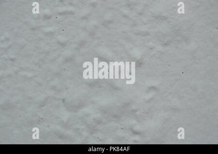 paint color swelling on old white wall Stock Photo - Alamy