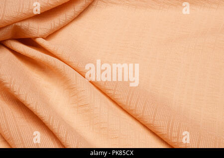 Cotton fabric peach color Stock Photo - Alamy