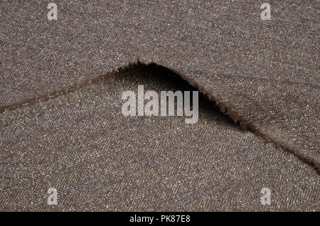 Woolen suit fabric gray-brown Stock Photo - Alamy