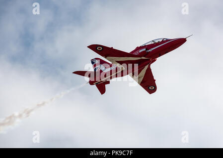 RAF Red Arrows BAE Hawk jet trainer aircraft lined up on runway nose ...
