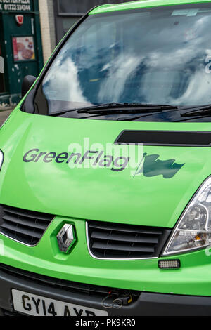 Green Flag breakdown van parked in residential street Stock Photo - Alamy