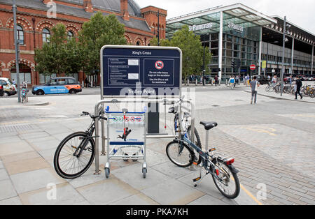 Trolley point Kings Cross station railway station trolleys baggage ...