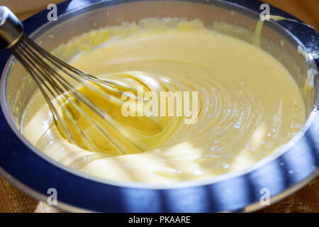 Cooking buttery cream on kitchen Stock Photo - Alamy
