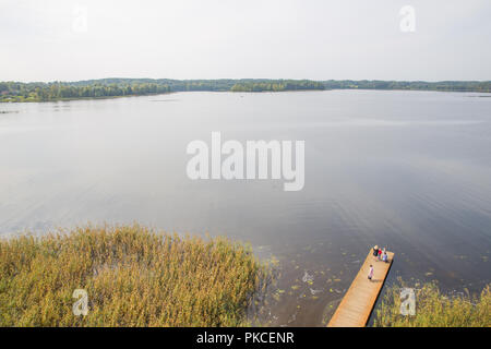 City Zarasi, Lithuania. Urban city, lake and park. Green nature boat ...