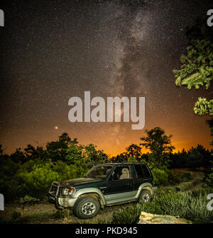 4x4 vehicle at night with milky way Stock Photo - Alamy