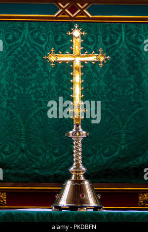 Gold cross on red background Stock Photo: 218497323 - Alamy