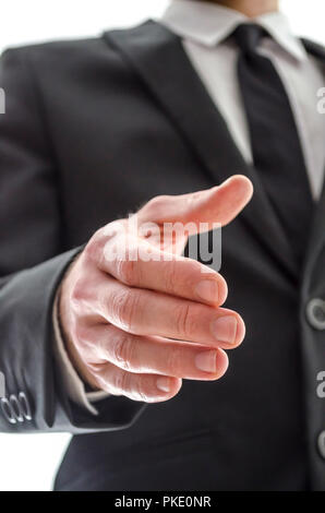 Cropped view of a business man offering a handshake Stock Photo - Alamy