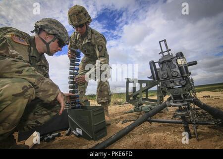 US Navy 40mm Practice grenades are lined up for loading Stock Photo - Alamy