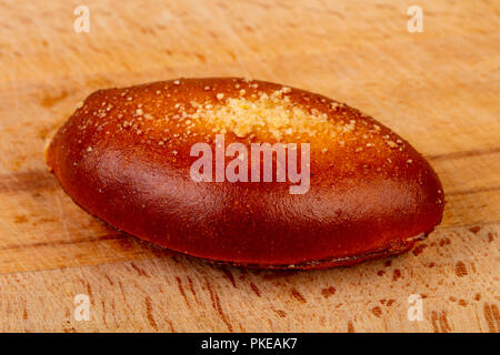 Tasty Stuffed pastry over wooden background Stock Photo - Alamy