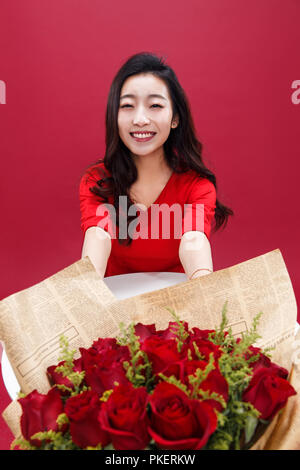 Young women received roses Stock Photo - Alamy