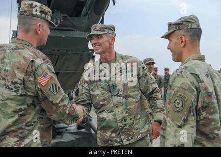 U.S. Army Maj. Gen. Marcus Evans, left, commanding general of the 25th ...