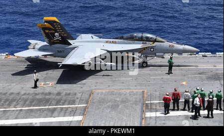 US Navy (USN) Ships launch a coordinated volley of SM-2MR Block II ...