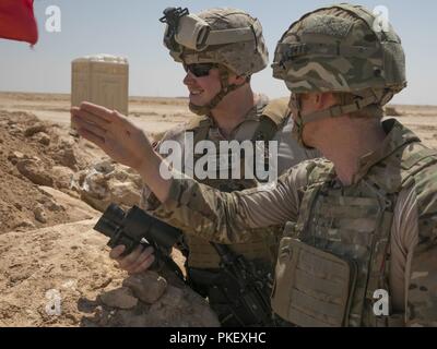 U.S. Marine Corps Maj. Justin Lenio, a company commander with 2d ...