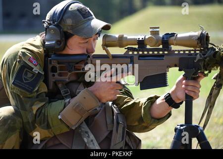 A U.S. Army soldier uses the scope on his M 4 rifle to scan the Stock ...