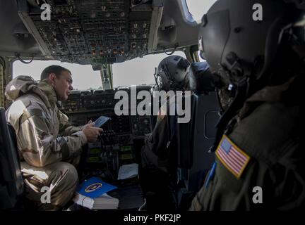 A Soldier wearing Mission Oriented Protective Posture (MOPP) gear ...