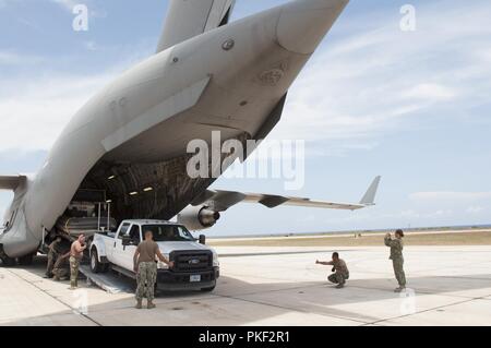 Coast Guardsmen from Port Security Unit 301 waterside division aboard a ...