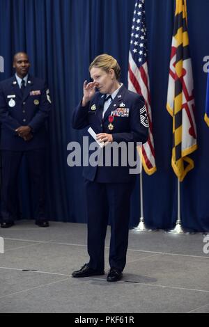 Retired U.S. Army Brigadier General John Hanley, left, chats with ...