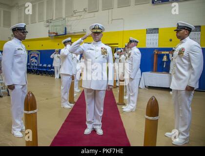 Rear Adm. Brad Collins, Commander, Navy Region Northwest, speaks at a ...