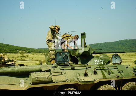A gunnery crew from the 1st Combined Arms Battalion, 63rd Armor Regt ...