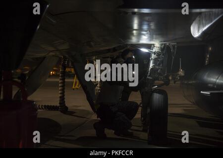 Colombian Air Force Kfir fighter jet crew chief signals a Kfir pilot on ...