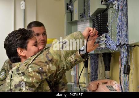 An Airman assigned to the 609th Air Operations Center works on the ...