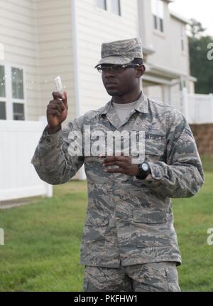 Airman 1st Class Donte Arrington, Barksdale honor guard member, sings the National Anthem at Lt ...