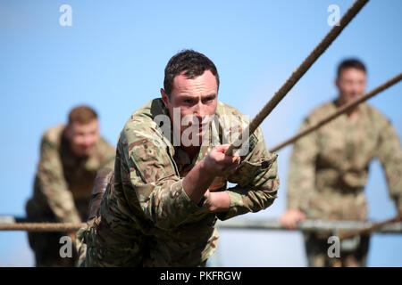Marine Commandos on the assault course as the Duke of Sussex visits the ...