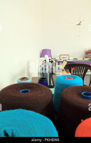 Woman with thread coils Stock Photo - Alamy