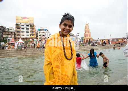 Hindu Child Sadhu after a holy dip at Panchavati ram kund in nashik ...