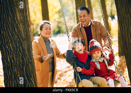 Happy family outdoor outing Stock Photo - Alamy