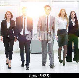 bottom view. business team walking forward Stock Photo - Alamy