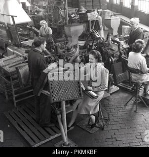 Women female workers on Ever Ready batteries production line 1960s ...