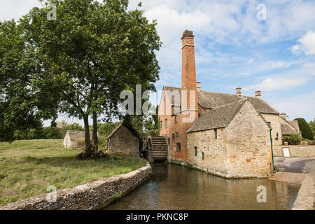The River Windrush at Windrush Mill in the Cotswold village of Windrush ...