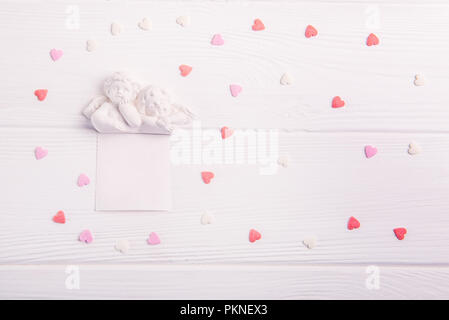 statuette valentine with hearts Stock Photo - Alamy