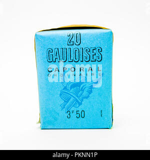 Old pack of Gauloises, typical french cigarettes on a white background ...