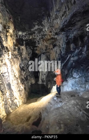 Spar Cave Isle of Skye Person with Torch Stock Photo - Alamy