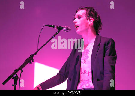 Matthew Healy, lead singer of The 1975, onstage during a major festival ...