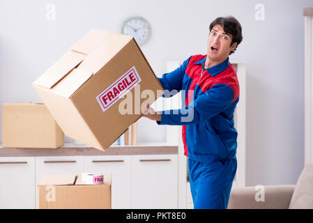 The transportation contractor with fragile boxes Stock Photo - Alamy