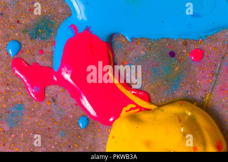 colorful of screen printing ink dropped on the ground made an abstract ...