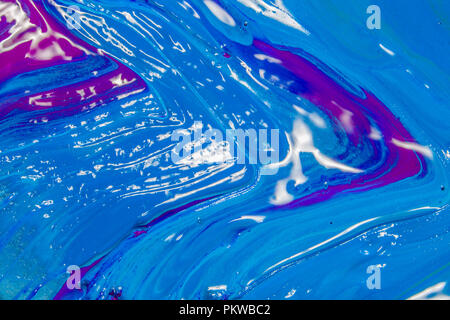 colorful of screen printing ink dropped on the ground made an abstract ...