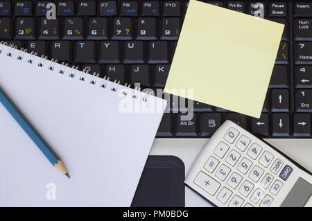 cactus plant calculator & notebook on office desk at workplace Stock ...