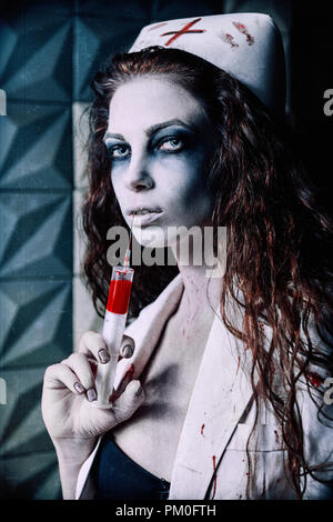 Horror shot: portrait of the undead nurse (doctor). Zombie woman ...