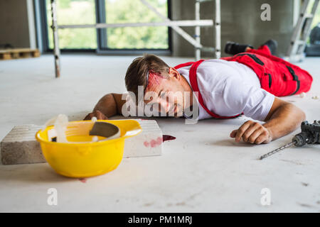 A man had accident with bleeding lying on patient bed in emergency room ...