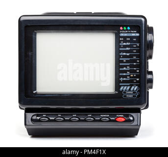 Vintage small portable color TV set with radio on white background ...