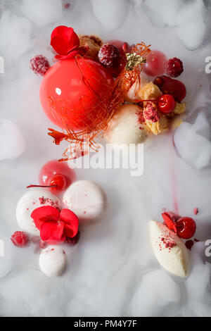 Cherry, yogurt spheres and cake Stock Photo - Alamy
