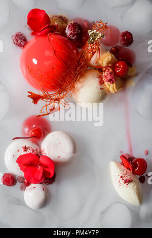 Yogurt spheres and berries Stock Photo - Alamy